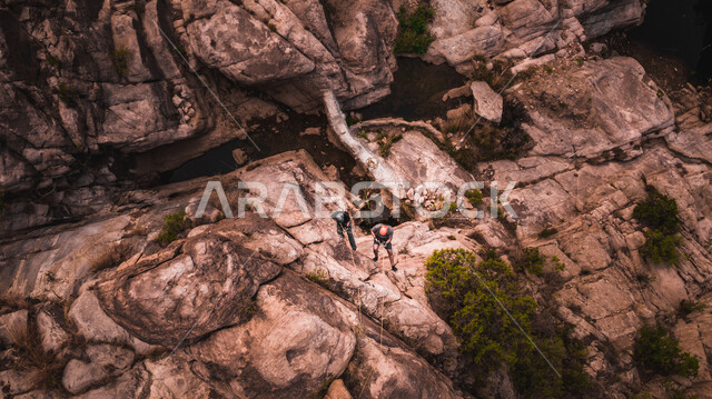 The rocky Tanumah Mountains in Asir in the Kingdom of Saudi Arabia, two ...