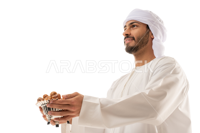 Portrait of an Arab Emirati Gulf man wearing traditional Emirati dress ...