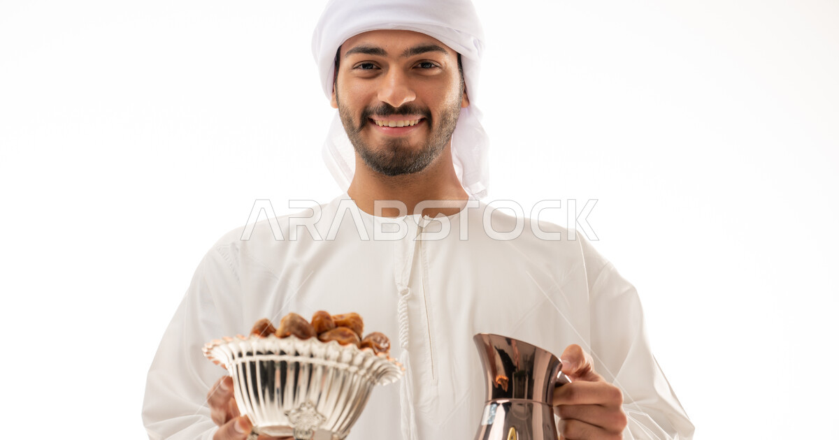 Portrait of an Arab Emirati Gulf man wearing traditional Emirati dress ...