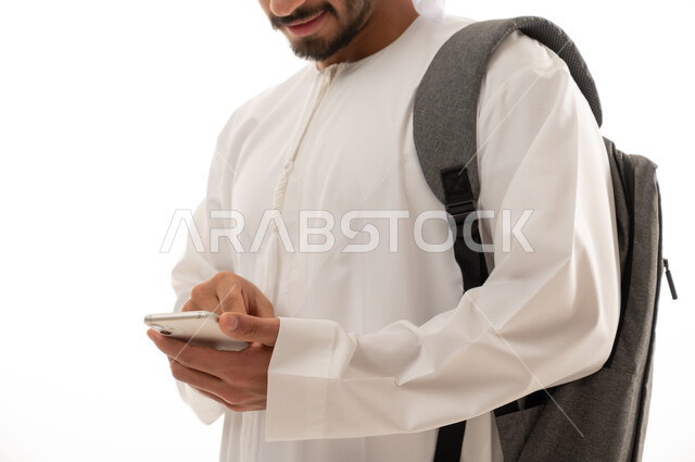 Portrait of an Emirati Arab Gulf youth in traditional Emirati dress ...