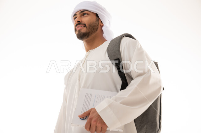 Portrait of an Arab Gulf Emirati university student in traditional ...