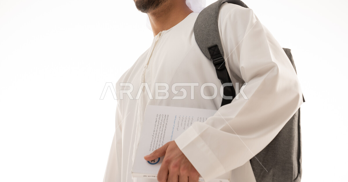 Portrait of an Arab Gulf Emirati university student in traditional ...