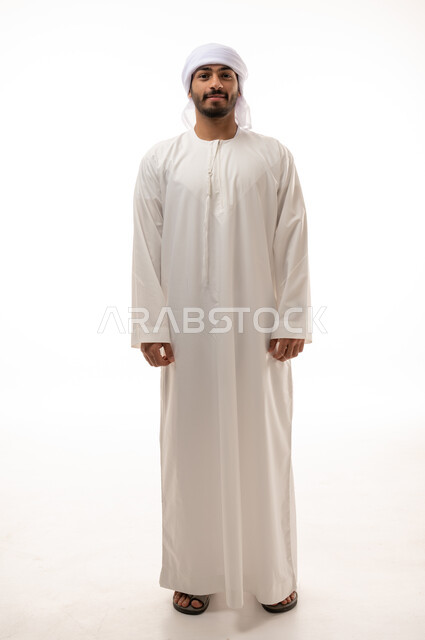 Portrait of a young Emirati Arab from the Gulf, dressed in the Emirati ...