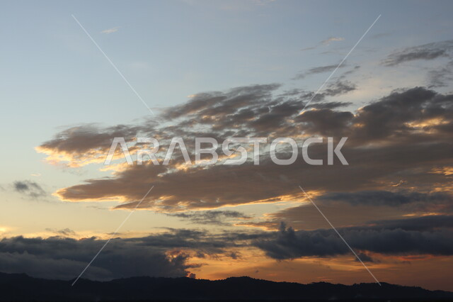 View of the sunset in the sky, the appearance of red twilight at sunset ...