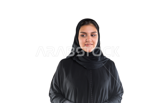 Portrait of a Saudi Arabian Gulf woman wearing an abaya and veil ...