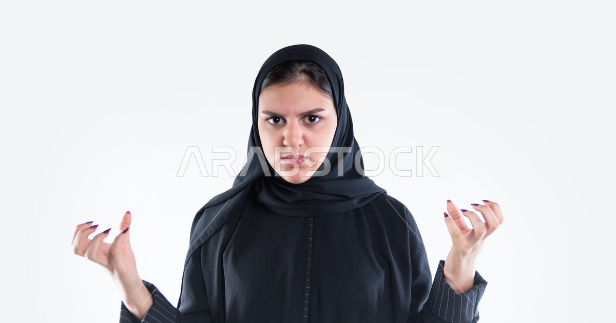 Portrait of a Saudi Arabian Gulf woman wearing the abaya and veil ...
