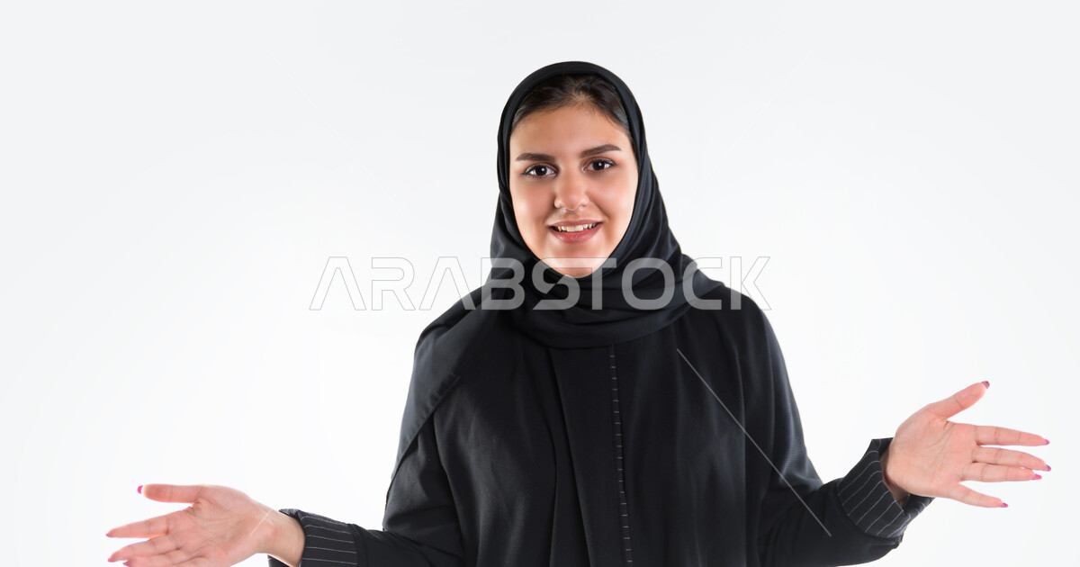 Portrait of a Saudi Arabian Gulf woman wearing an abaya and hijab ...