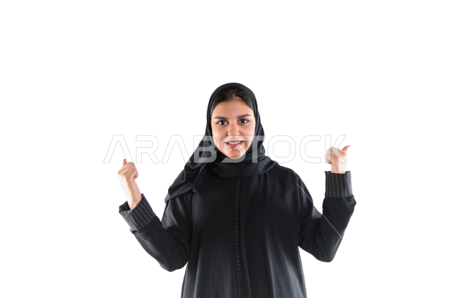 Portrait of a Saudi Arabian Gulf woman wearing an abaya and veil ...