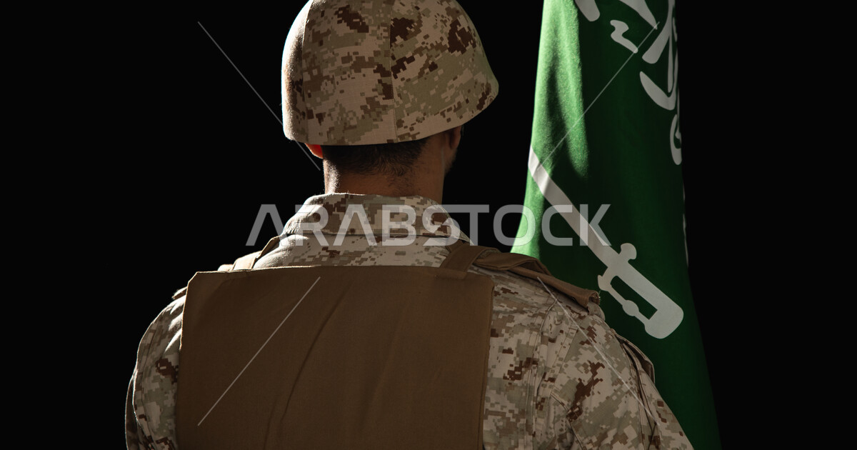 Saudi Flag Day, a portrait from behind of a Saudi Arab Gulf soldier ...