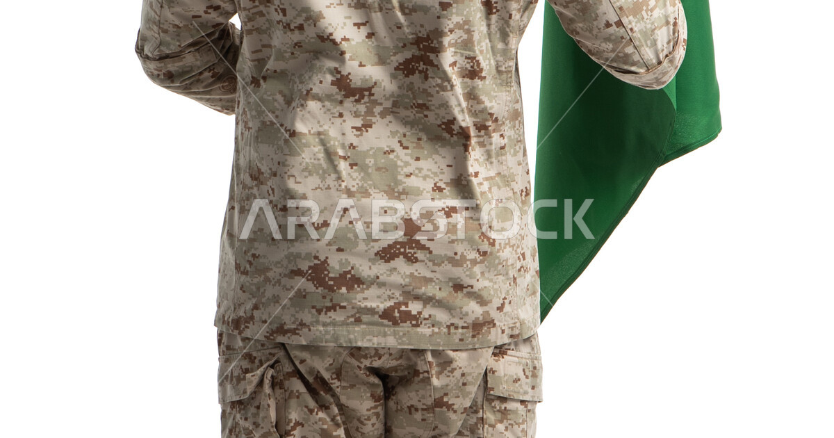 Celebrating the Saudi National Day 92, a portrait from behind of a ...