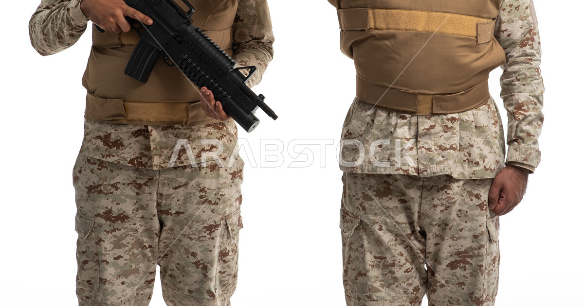 Gestures indicating standing with discipline, a portrait of two Saudi ...