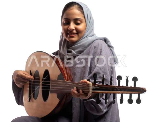 Practicing the hobby of playing using the Oud instrument, musical ...