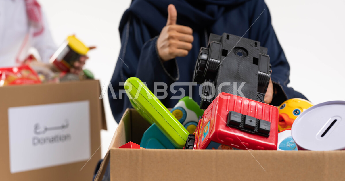 Portrait of a woman raising the index finger with gestures indicating ...