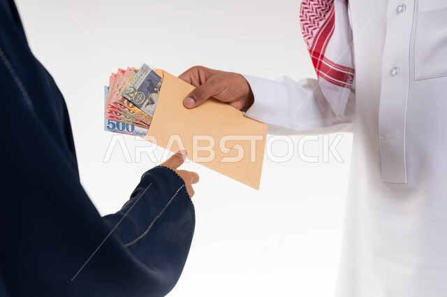 Paying zakat money to the needy, giving and charity in the month of ...