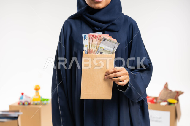 Help and donation, charity in the month of Ramadan, a close-up portrait ...