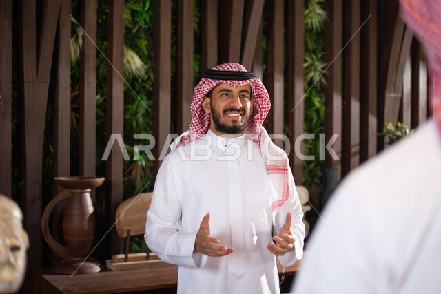 Customer service, facial gestures indicating joy and pleasure, a Saudi ...