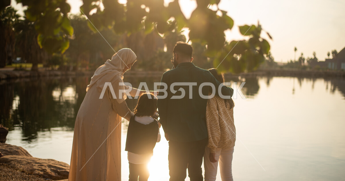 A Saudi Gulf Arab family outdoors, a fishing trip, recreational ...