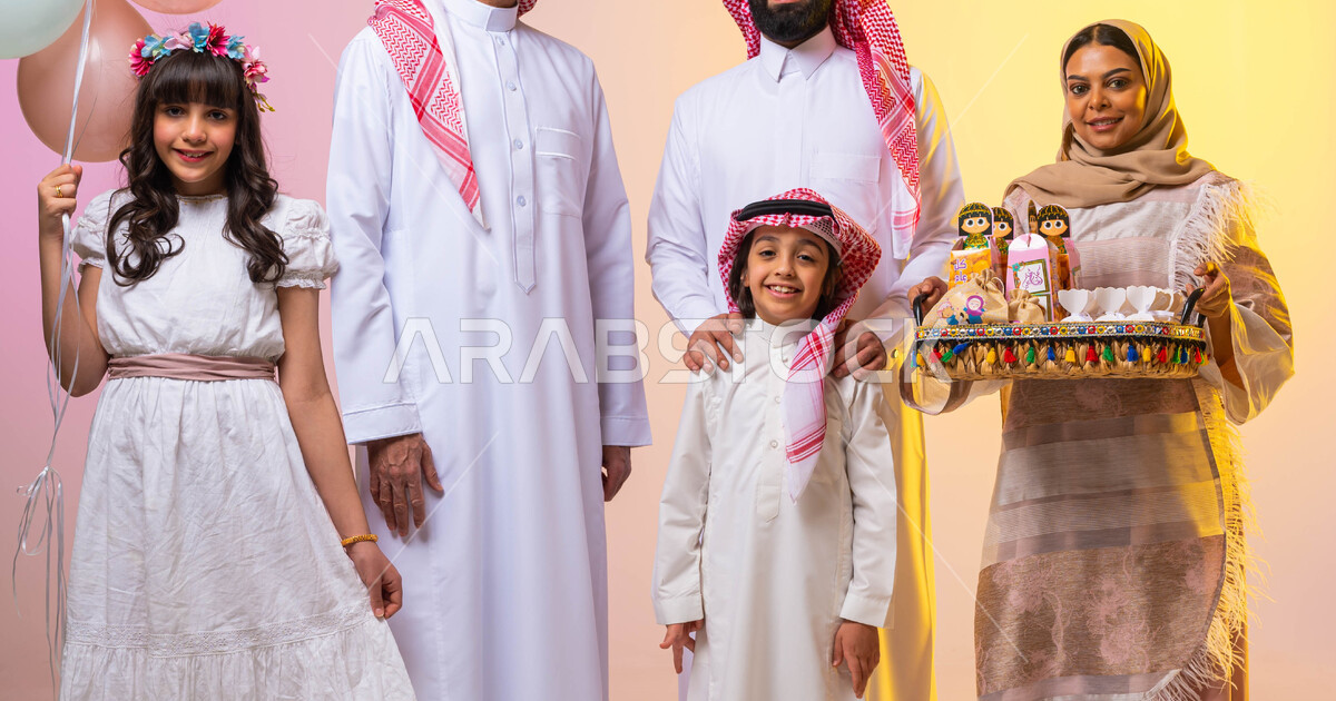 Portrait of a Saudi Arabian Gulf family celebrating the days of Eid ...