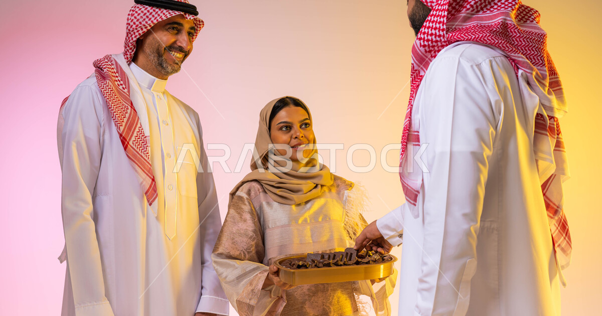 Portrait of a Saudi Arabian Gulf family celebrating Eid days, happy ...