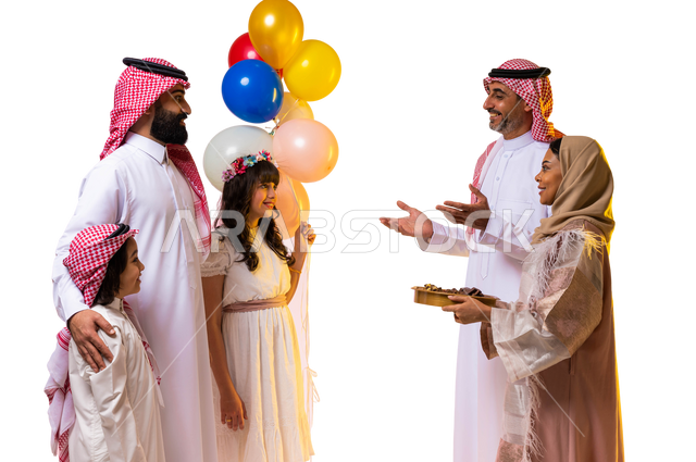 Portrait of a Saudi Arabian Gulf family celebrating the days of Eid ...