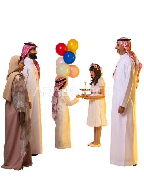 Portrait of a Saudi Arabian Gulf family celebrating Christmas, birthday ...