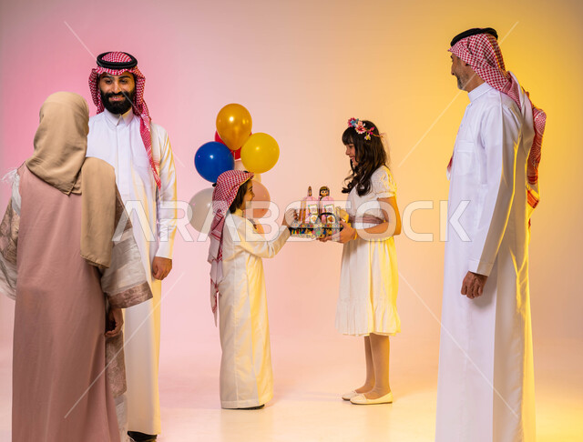 Portrait of a Saudi Arabian Gulf family celebrating the Happy Eid, Eid ...