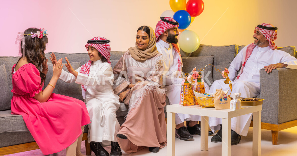 Fun and play in the feast, a happy family atmosphere, a portrait of a ...