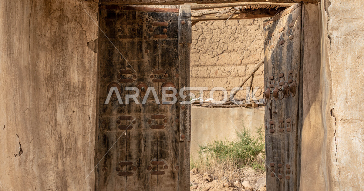 A close-up of the doors of mud houses in Asir, Saudi Arabia, old ...