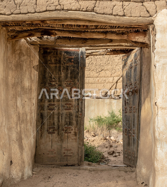 A close-up of the doors of mud houses in Asir, Saudi Arabia, old ...