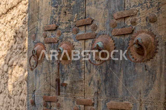 A close-up of the doors of mud houses in Asir, Saudi Arabia, old ...