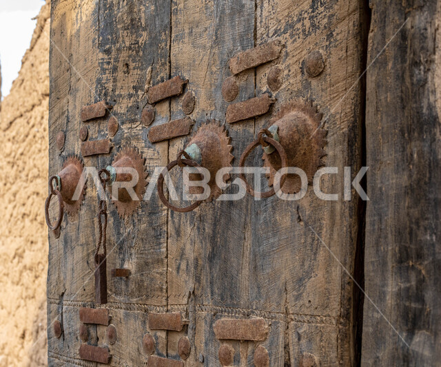 A close-up of the doors of mud houses in Asir, Saudi Arabia, old ...