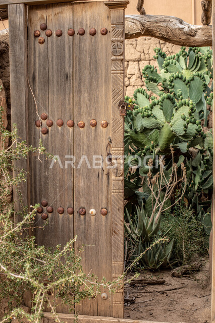 A close-up of the doors of mud houses in Asir, Saudi Arabia, old ...