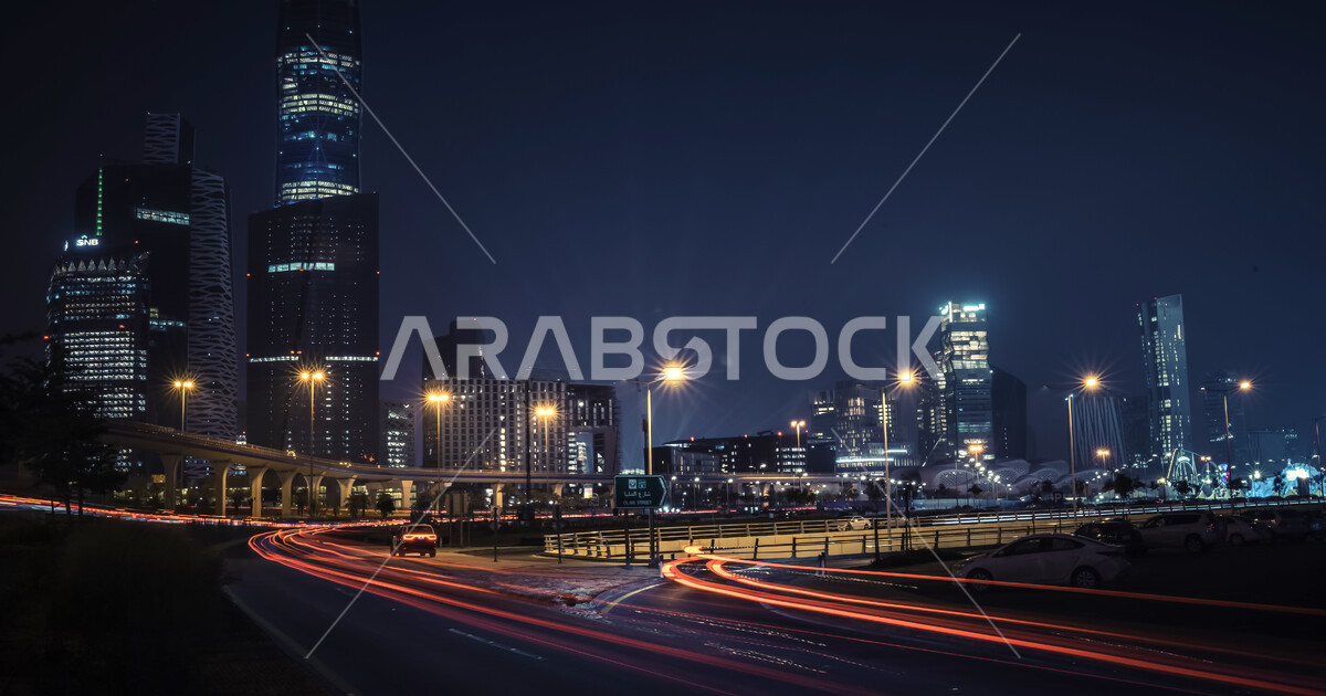 Car traffic in the streets of Riyadh at night, King Abdullah Financial ...
