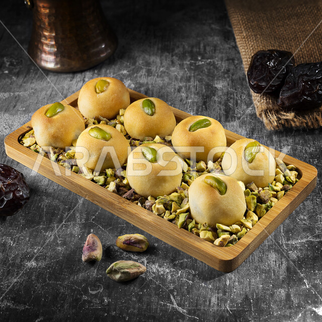 A picture of maamoul stuffed with dates, one of the fragile and ...