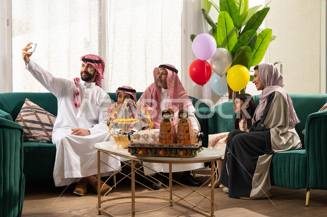 Joy and joy on Islamic occasions, a family gathering of a Saudi Gulf ...