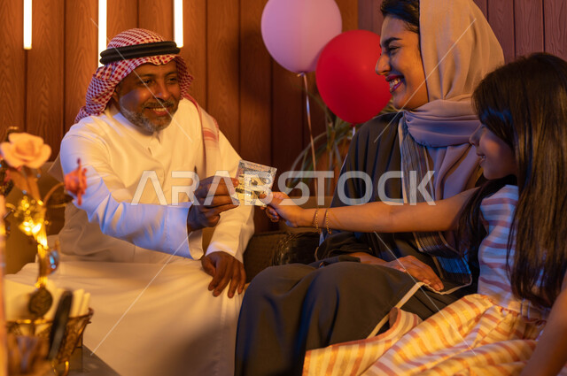 Congratulations on the advent of the blessed Eid, an elderly Arab Saudi ...