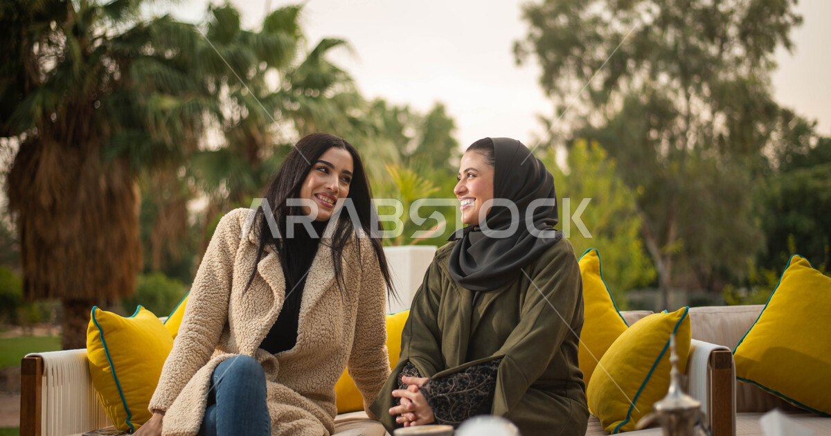 Spending fun times in the green nature and sitting in the open air, two ...