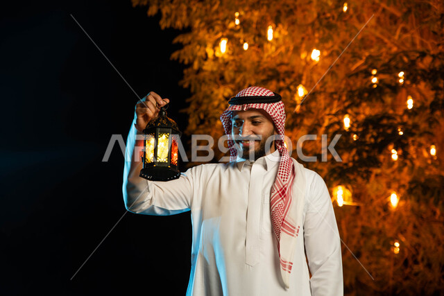 The blessed month of Ramadan, a Saudi Arabian Gulf man wearing the ...