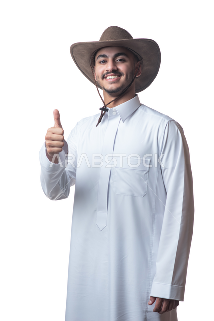 Portrait of a Saudi Arabian Gulf youth wearing the famous cowboy hat ...