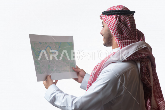 Angled picture of a young Saudi Arabian Gulf tour guide, wearing ...