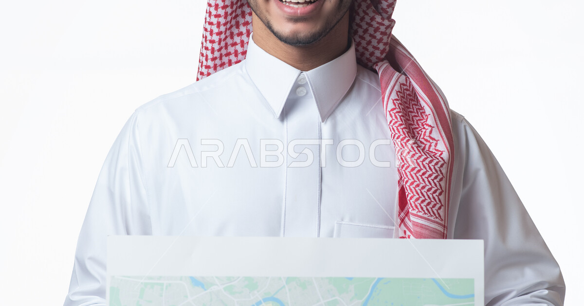 Portrait of a young Saudi Arabian Gulf Arab tour guide wearing ...