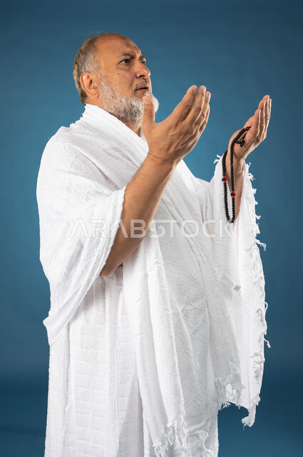 Performing the rituals of Hajj and Umrah, wearing Ihram clothes, a ...