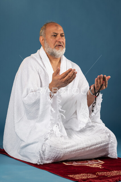 Performing the rituals of Hajj and Umrah, a portrait of an elderly ...