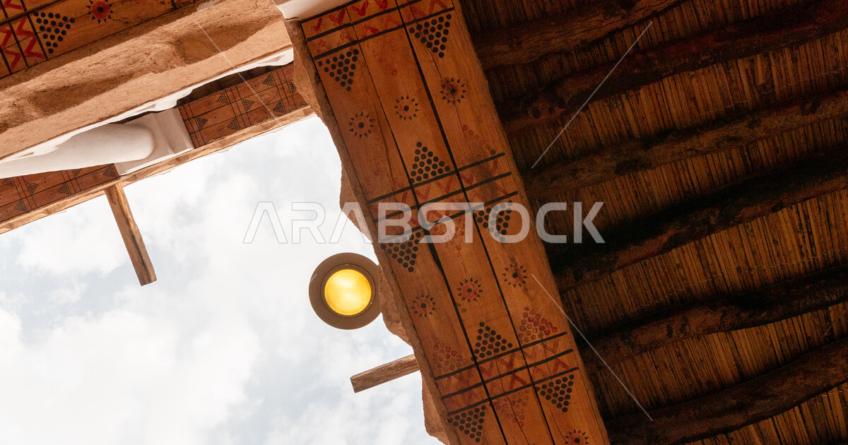 A close-up of a decorated wooden ceiling in the Saudi National Museum ...