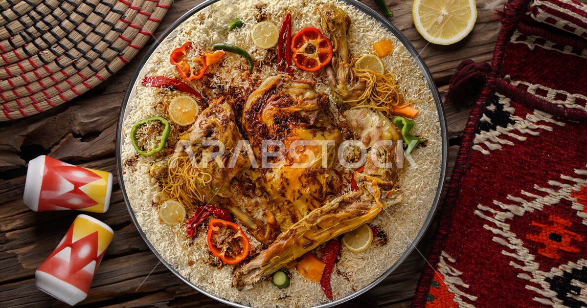Delicious healthy meals, a picture from above of a dish of Kabsa rice ...