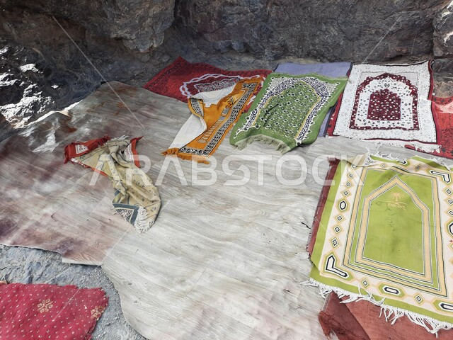 A group of prayer rugs on the mountains of Medina in the Kingdom of ...