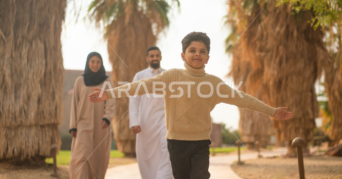 Wandering and walking in a happy family atmosphere in the green nature ...