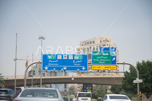 Roads, streets and landmarks of Riyadh, indicative traffic signs, car ...