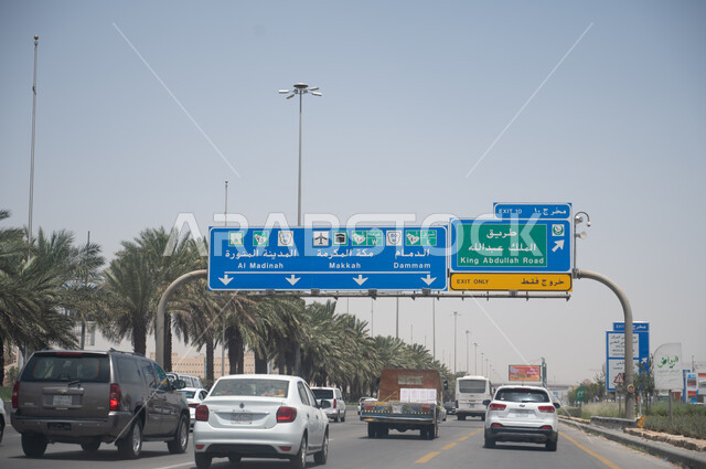 Indicative traffic signs, car traffic in the city of Riyadh in the ...