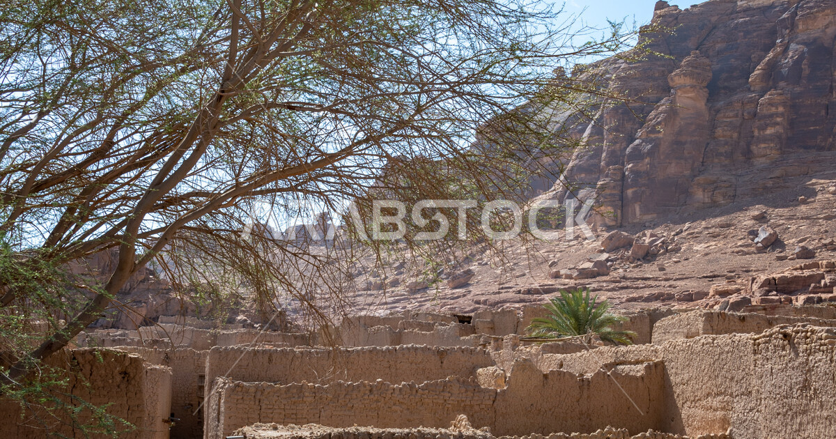 Rock formations in desert areas, green trees and plants, ancient houses ...